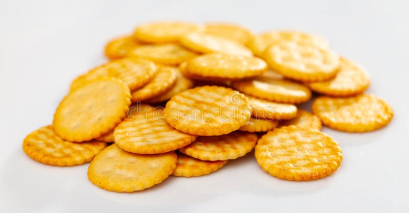 Crispy Salted Round Crackers on White Table Stock Photo - Image of chip ...