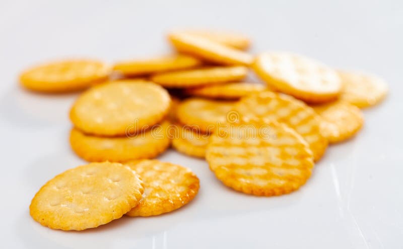 Crispy Salted Round Crackers on White Table Stock Image - Image of ...