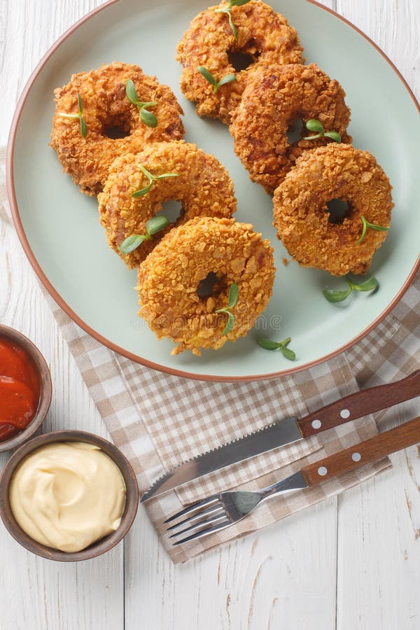 Crispy Savory Breaded Chicken Donuts Closeup on the Plate. Vertical Top ...