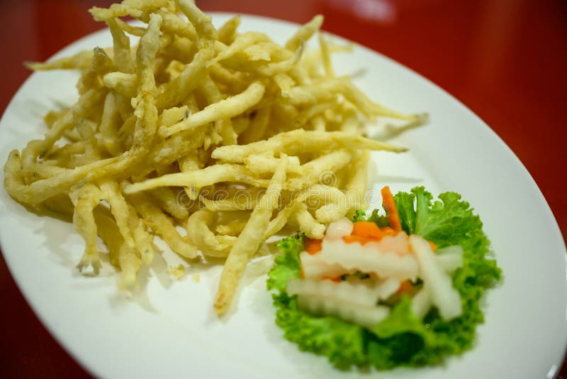 Crispy Silver Fish on a White Plate, Red Table Stock Image - Image of ...