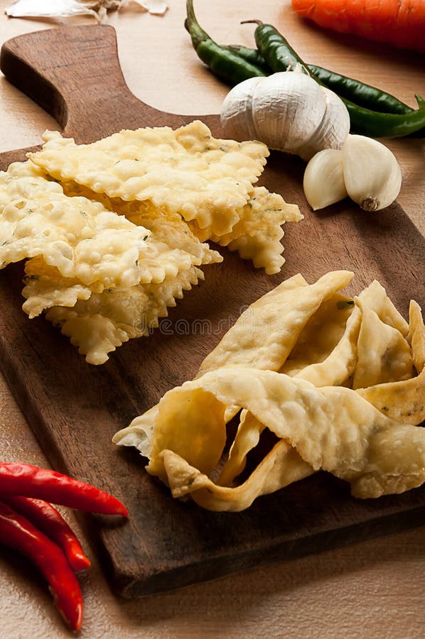 Crispy Snack on Cutting Board Stock Photo - Image of crispy, snack ...