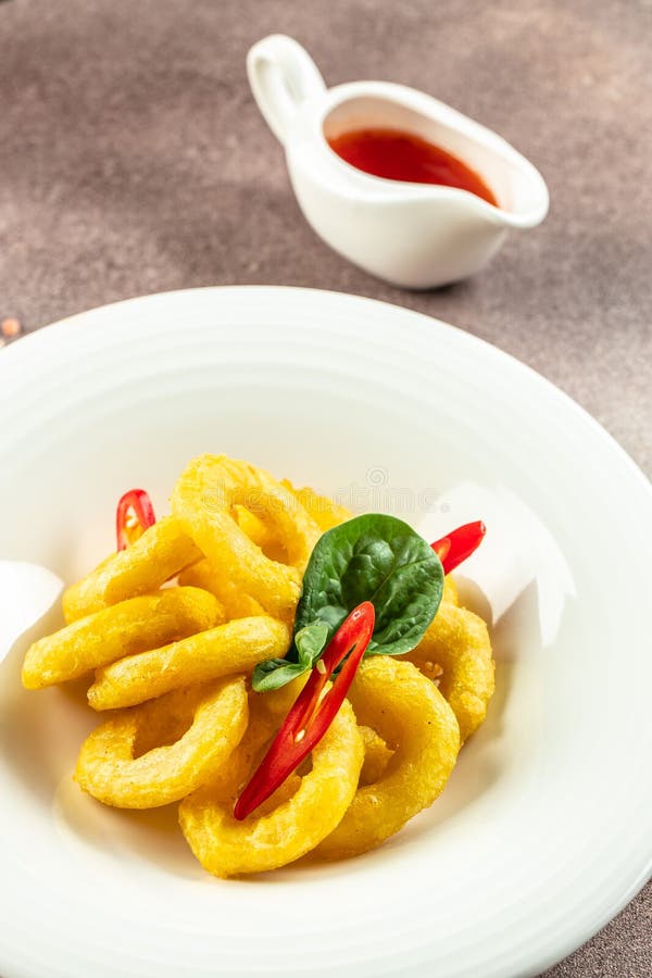 Crispy Squid Rings Served with Sweet Chilli Sauce, Vertical Image. Top ...