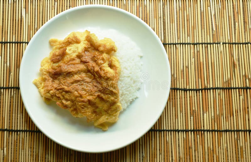 Crispy Thai Egg Omelet Topping Plain Rice on Plate Stock Photo - Image ...