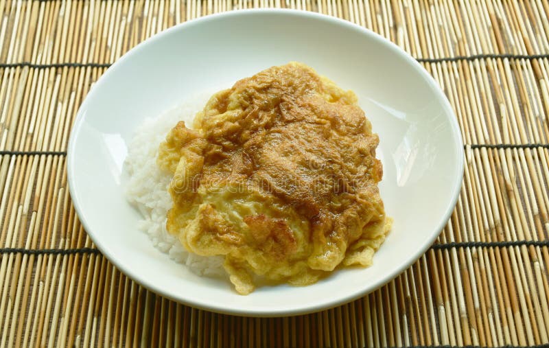 Crispy Thai Egg Omelet Topping Plain Rice on Plate Stock Photo - Image ...