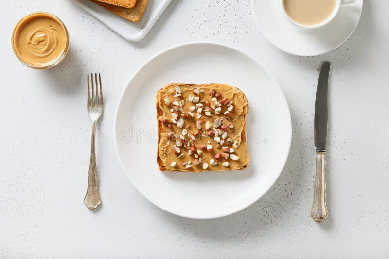 Crispy Toast with Peanut Paste for Healthy Breakfast on White. View ...