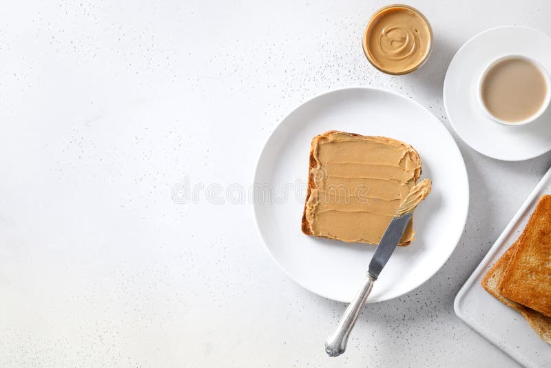 Crispy Toast with Peanut Paste for Healthy Breakfast on White. View ...