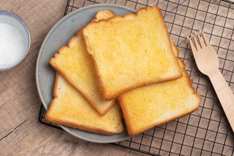 Crispy Toasted Bread with Butter and Sugar Stock Photo - Image of crisp ...