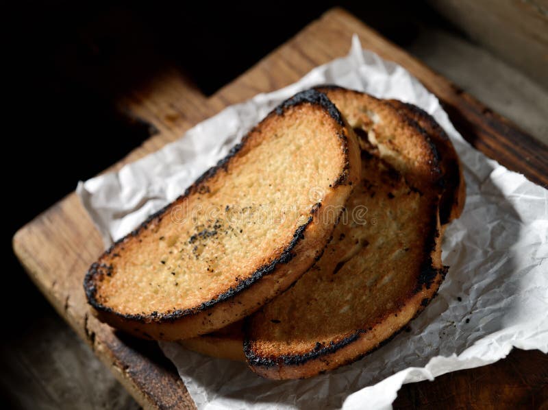 Crispy Toasts Paper Cutting Board Dark Background Stock Photos - Free ...