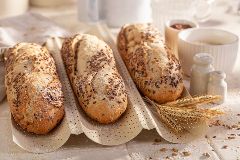 Crispy Wholegrain Baguettes Baked in a Bright Rustic Kitchen Stock ...
