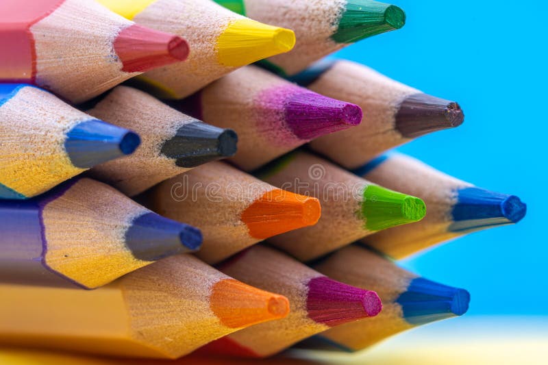 Crisscross Pattern of Colorful Pencil Tips on Gradient Background Stock ...