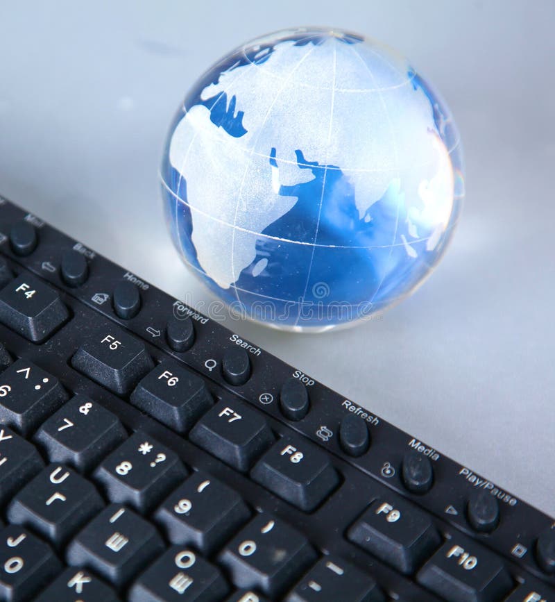 Cristal Globe of the Earth on a Computer Stock Image - Image of ...