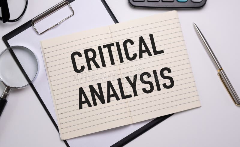 CRITICAL ANALYSIS Text on Clipboard with Chart on White Background ...