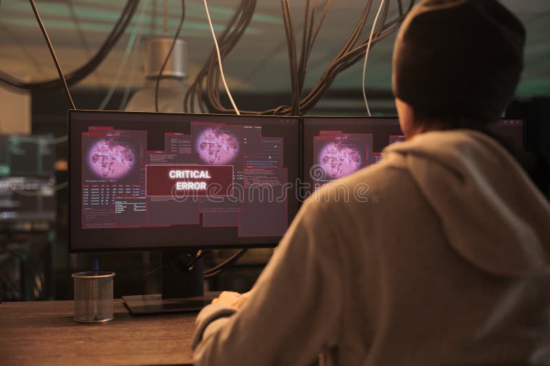Critical Error Alert on Multiple Monitors Late at Night Stock Photo ...