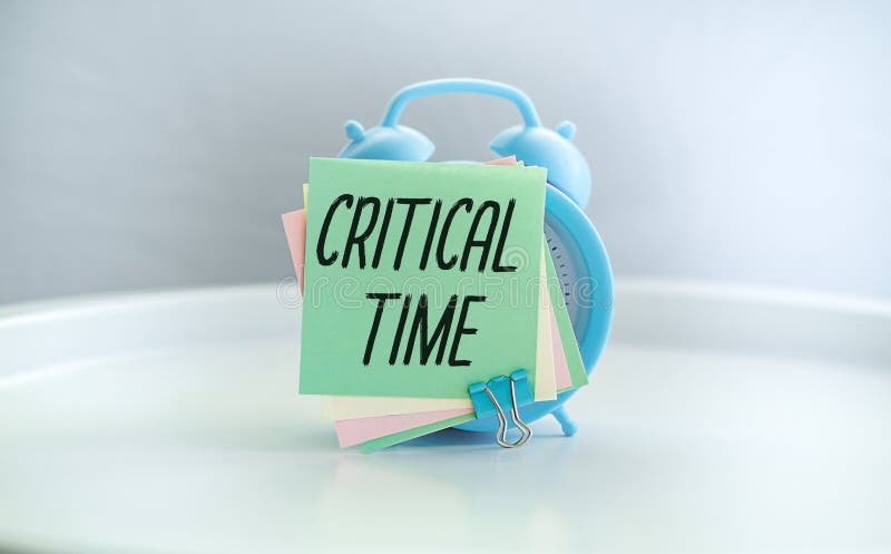 Critical Time - Text on Light White Background with Blue Alarm Clock ...