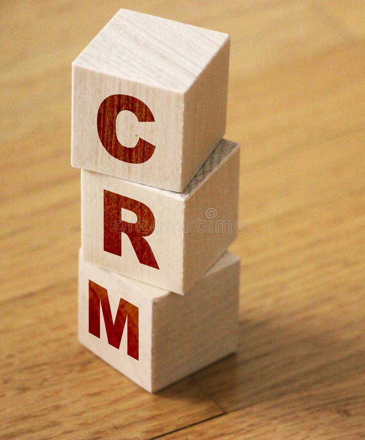 CRM, Customer Relationship Management on Wooden Blocks. Business ...