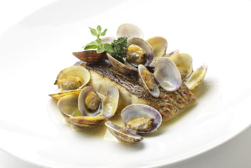 Croaker Fillet Braised with Clams and Broth of Smoked the Stock Image ...
