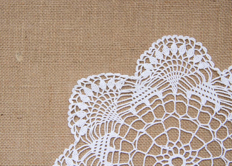 Crochet doily over burlap stock image. Image of fiber - 38710137
