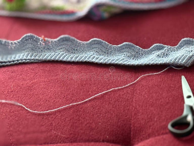 Crochet Handwork Left on a Red Sofa Stock Photo - Image of sofa ...