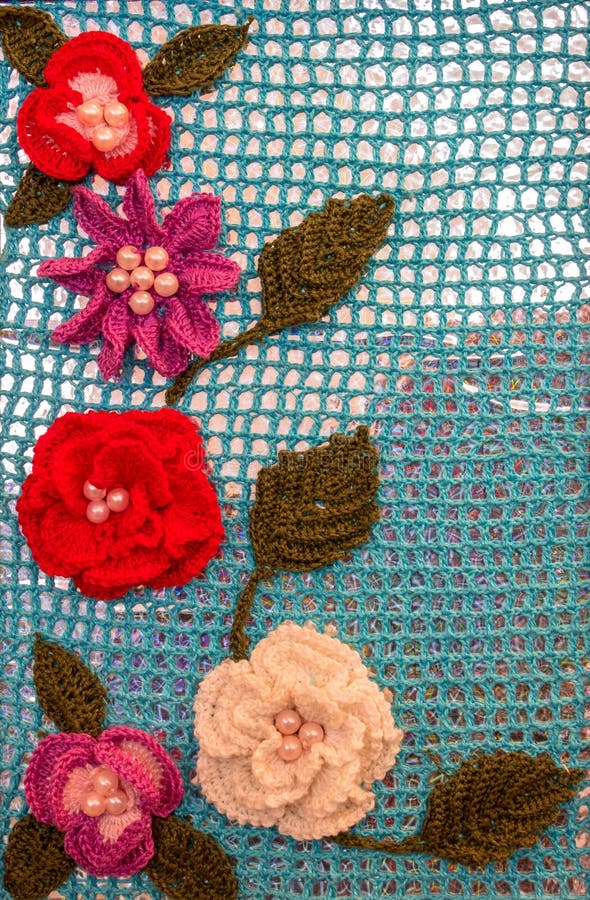 Crocheted Flowers on a Blue Background Stock Image - Image of ...