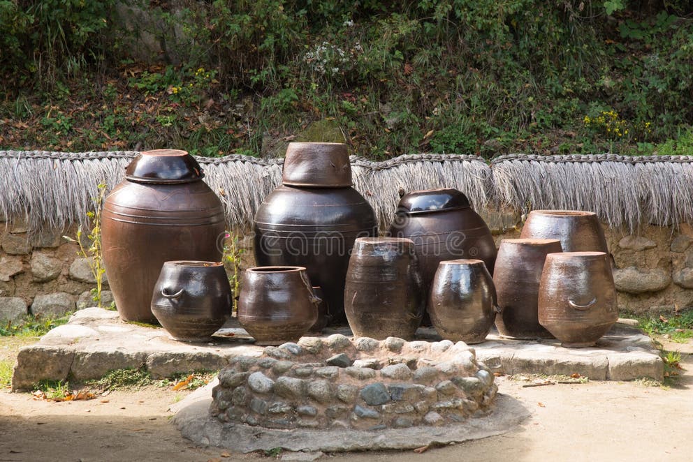 Crocks of Sauces and Condiments Stock Photo - Image of container, food ...