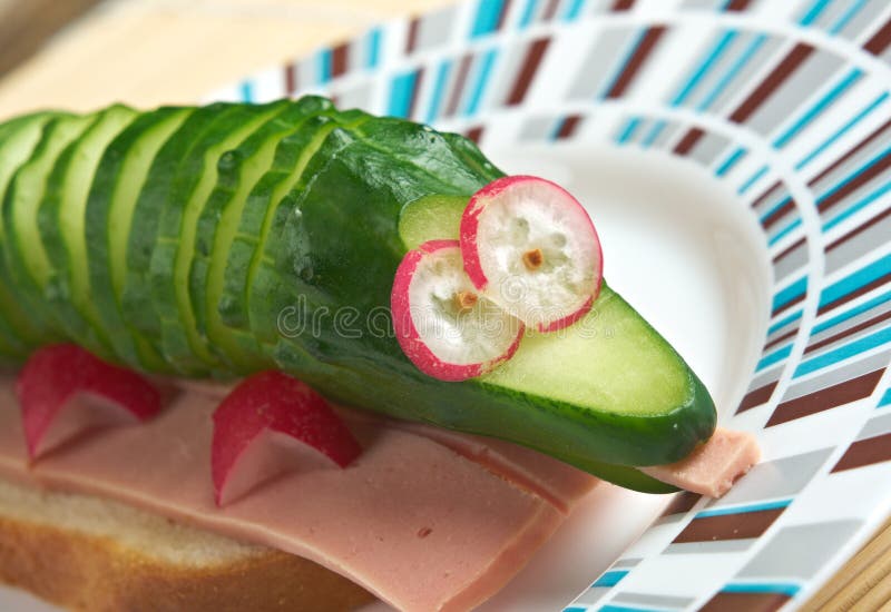 Cucumber crocodile stock photo. Image of grape, foodcarving - 47105616