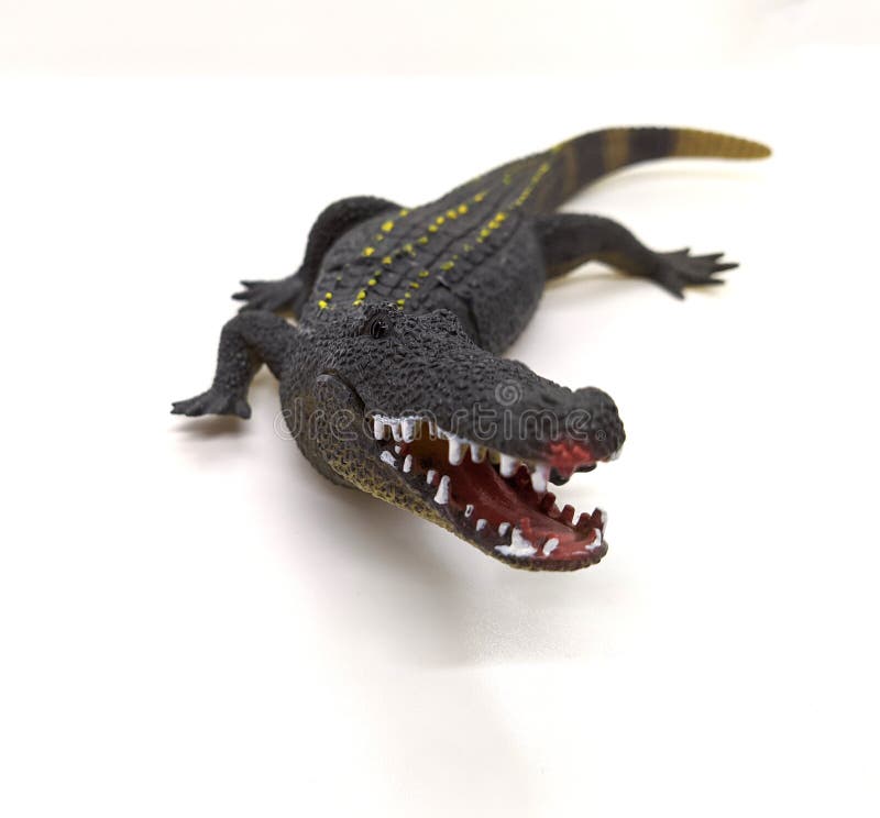 Crocodile Toy Made of Plastic on a White Background. Stock Image ...