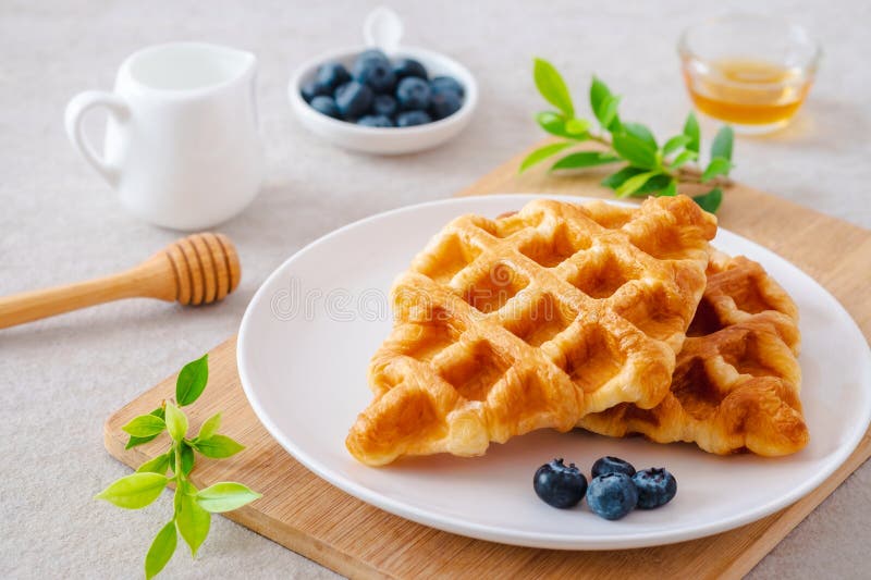 Croffle or Croissant Waffle with Blueberries on Plate Stock Photo ...