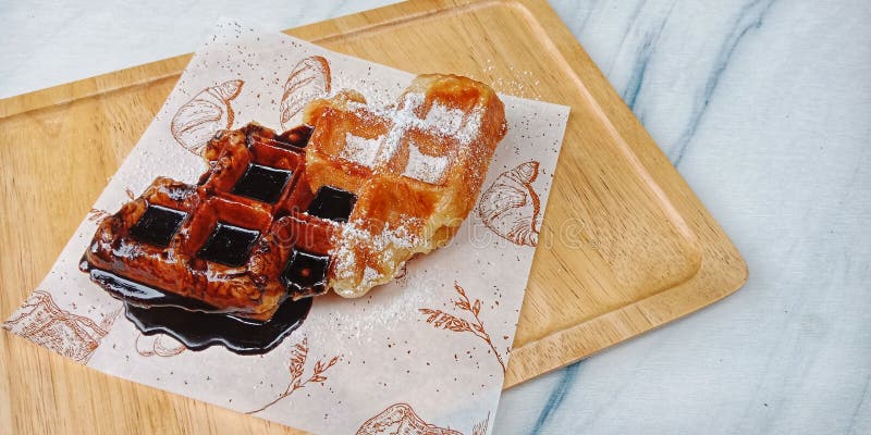 Croffle with Chocolate Cream Sauce Stock Photo - Image of bread, green ...