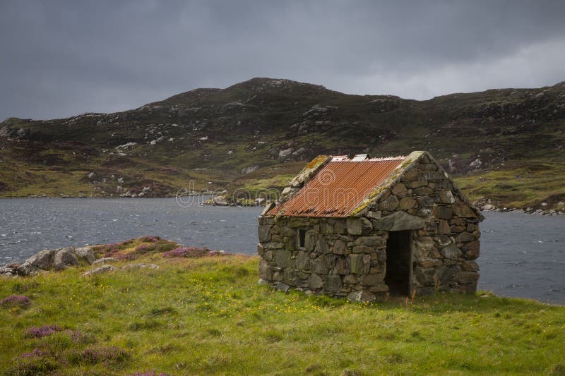 Crofters Hut Next To a Loch Stock Image - Image of hebrides, archeology ...