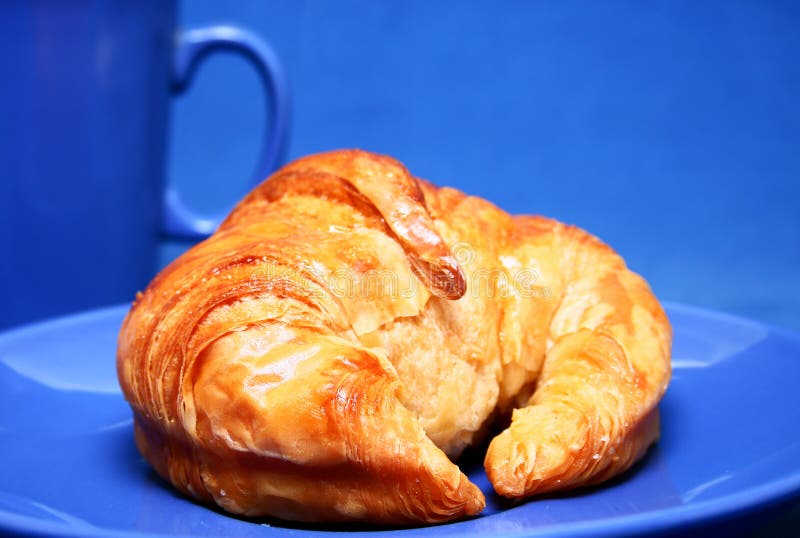 Croissant on Blue Background. Horizontal Image Stock Image - Image of ...