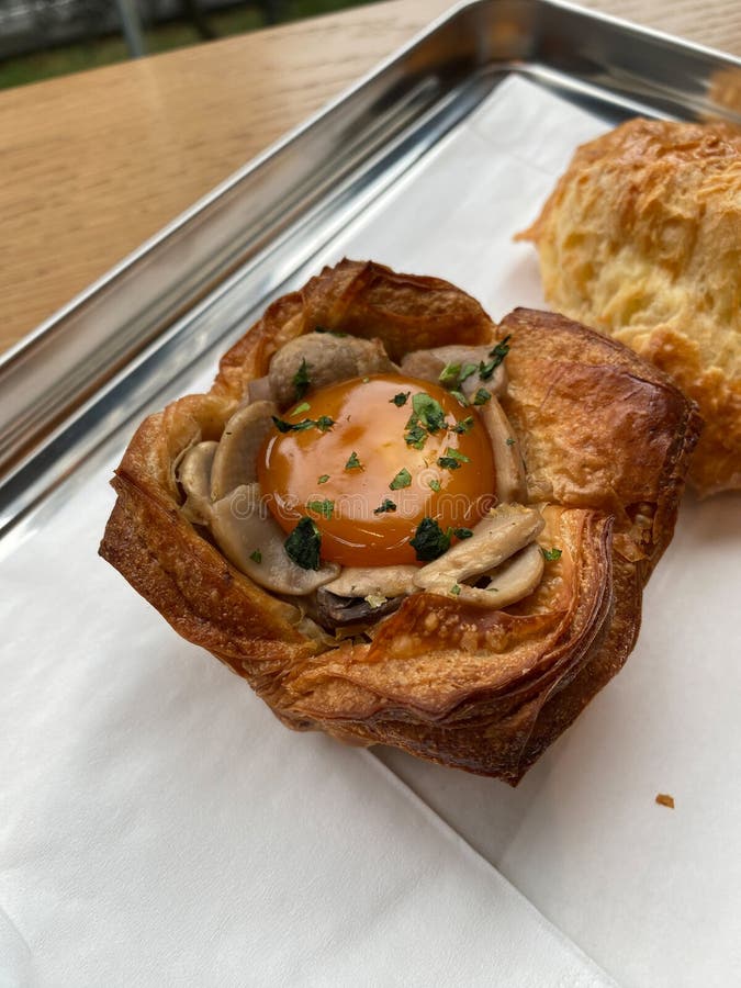 Croissant with Cold Egg Yolk and Mushrooms Stock Photo - Image of sweet ...
