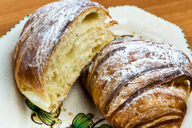 Croissant in colored dish stock photo. Image of isolated - 69730106