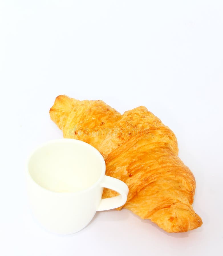Croissant and cup stock photo. Image of studio, organic - 20557804