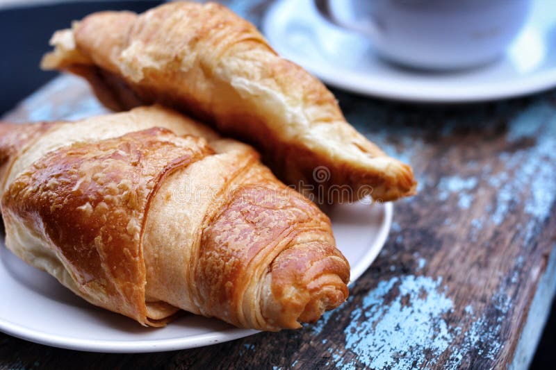 Croissant and a cup coffee stock photo. Image of breakfast - 34541906