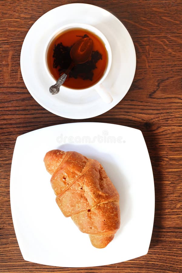 Cup of Tea with French Croissant Stock Image - Image of fresh, herb ...