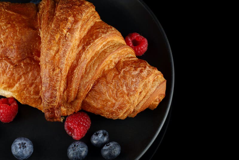 Croissant with Jam and Berries on a Black Plate. Traditional Breakfast ...