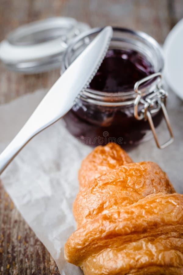 Croissant and Jam in a Jar on a Wooden Table Stock Image - Image of ...