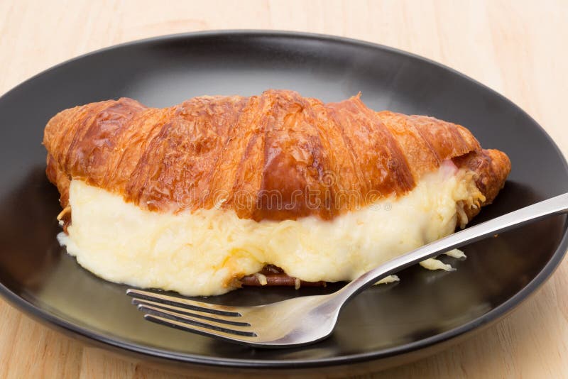 Croissant with Melted Cheese Stock Photo - Image of grated, sandwich ...