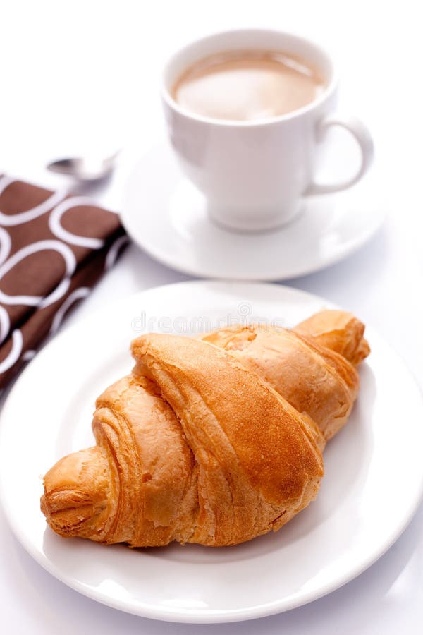 Croissant met cappuchino stock afbeelding. Image of room - 17693731