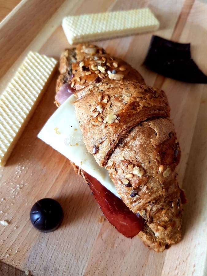 Croissant Sandwich with Cheese, Ham, Tomato and Raisins Stock Image ...