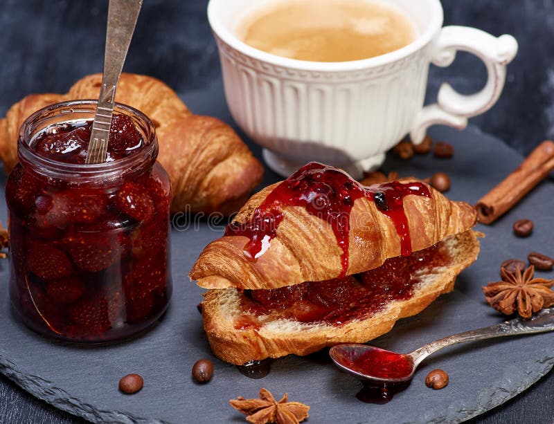 Croissant with Strawberry Jam and White Cup with Coffee Stock Photo ...