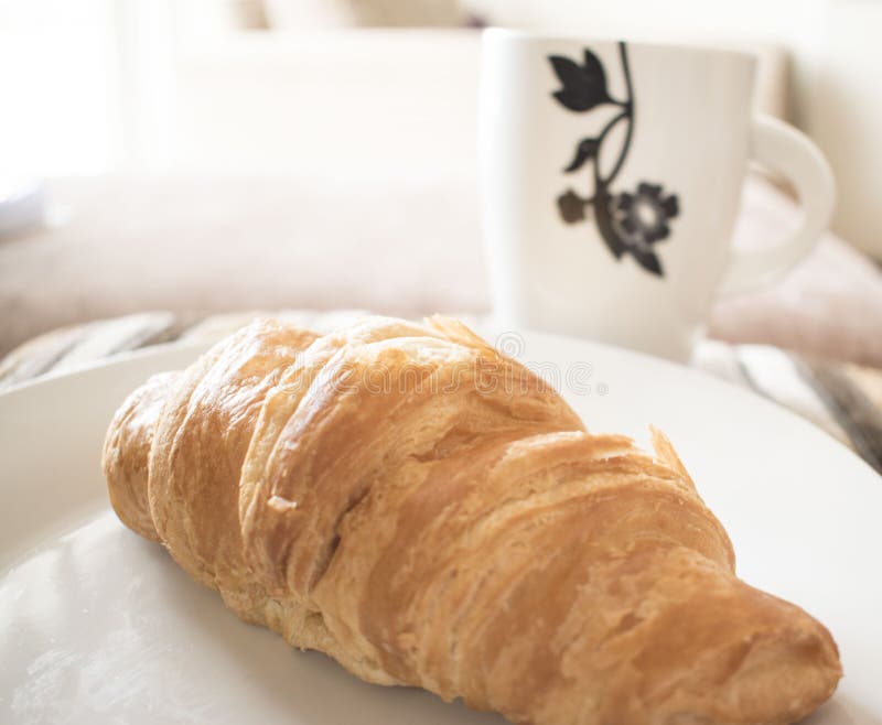 Croissant and tea stock image. Image of snack, bakery - 79590893