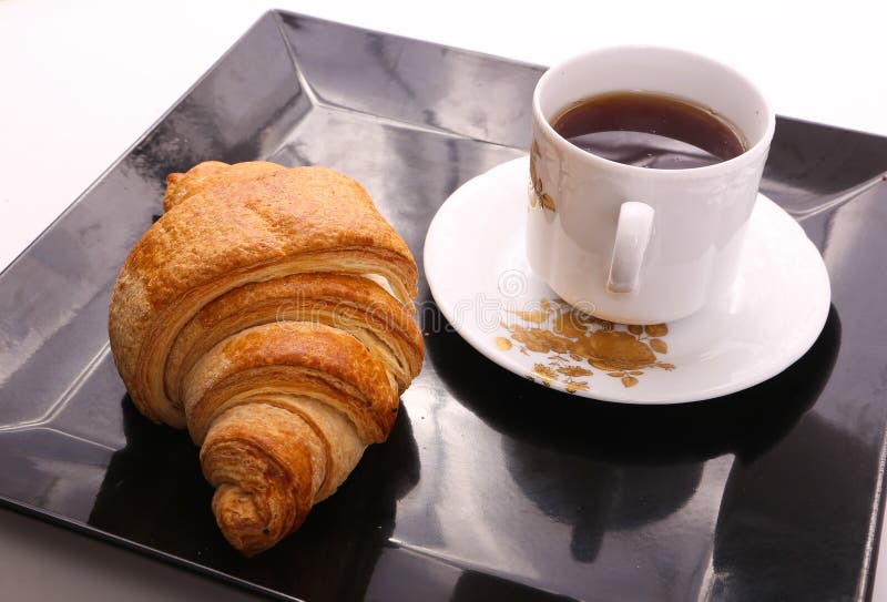 Croissant with tea stock image. Image of healthy, flour - 113724851