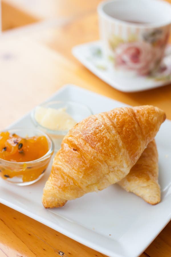 Croissant with tea stock photo. Image of food, close - 42027214