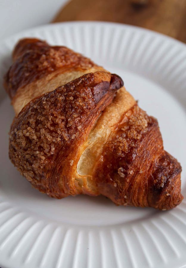 Croissant in a White Plate and Wood Desk Stock Image - Image of ...