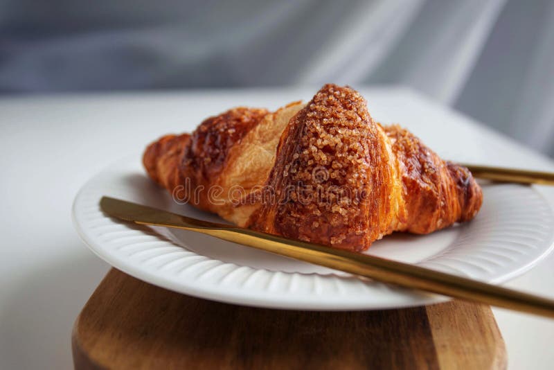 Croissant in a White Plate and Wood Desk Stock Photo - Image of girl ...