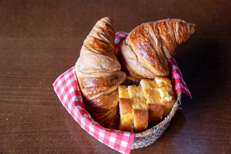 Croissants and Bread Sit in Baskets on a Table Stock Photo - Image of table, delicious: 281896478