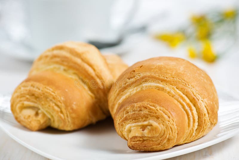 Croissants with cup of tea stock image. Image of delicious - 25979965