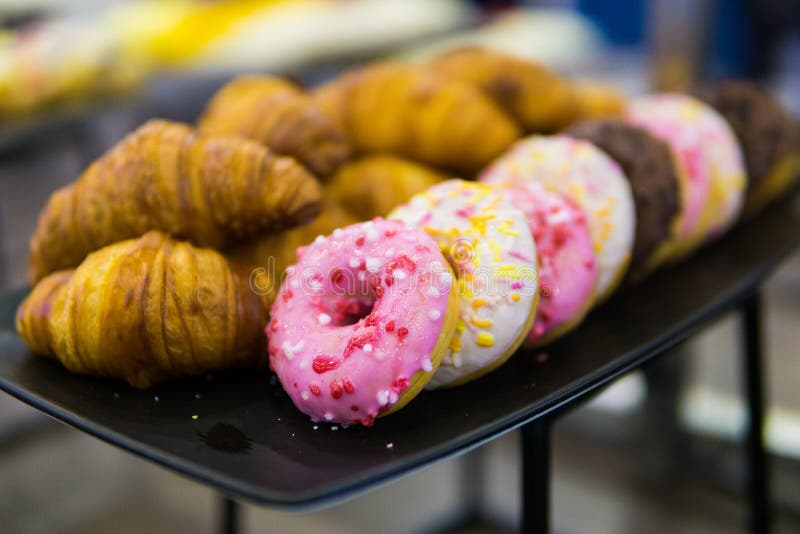 Croissants, Donut and Other Sweets on the Buffet Table during the ...