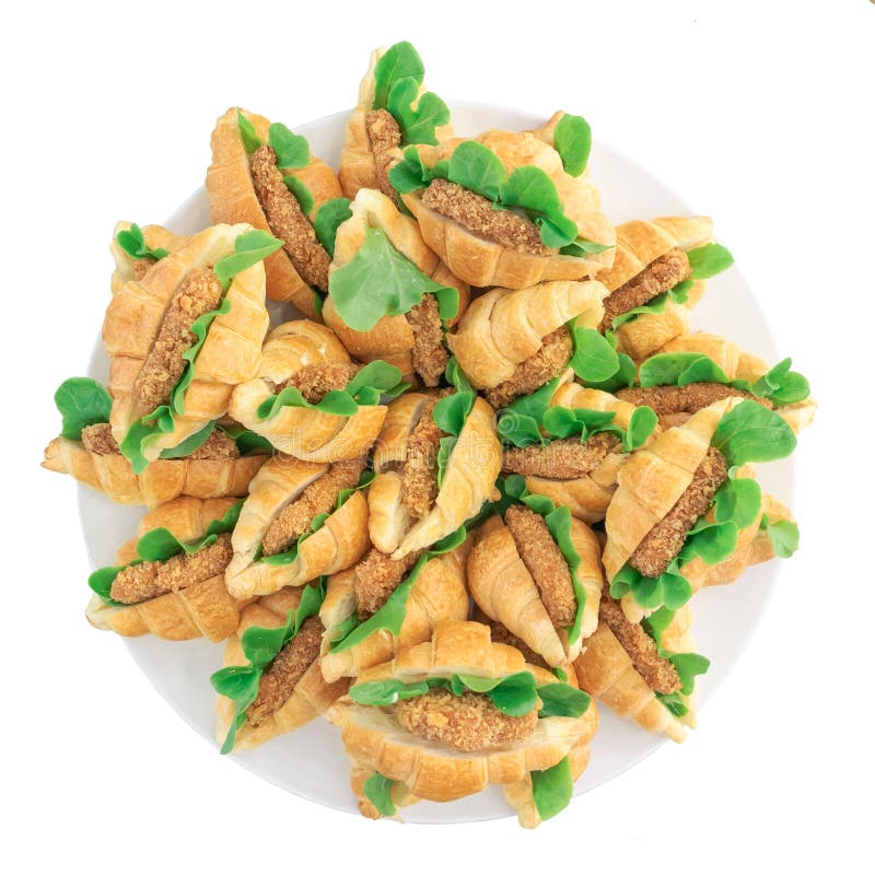 Croissants with Fried Chicken Arranged in a Dish with Green Vegetables ...